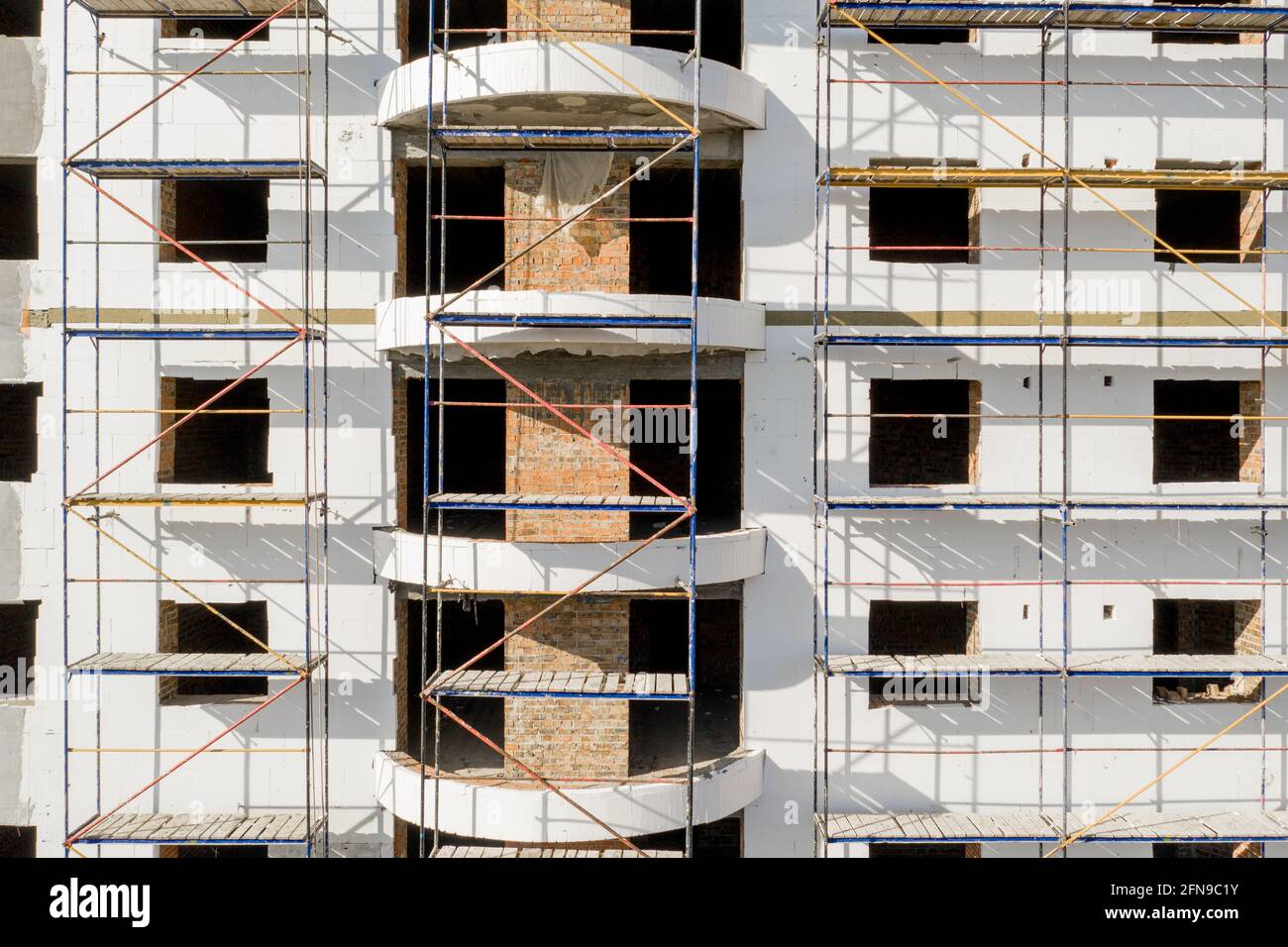 scaffold near the high-rise building for plaster Stock Photo - Alamy