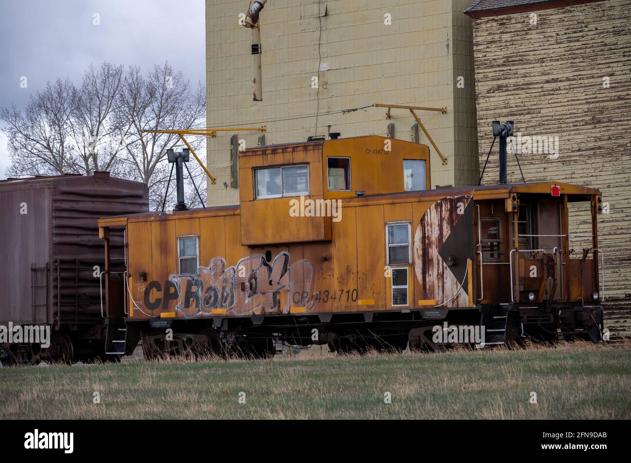 Mossleigh, Alberta - May 1, 2020: Abandoned caboose on rail tracks in ...