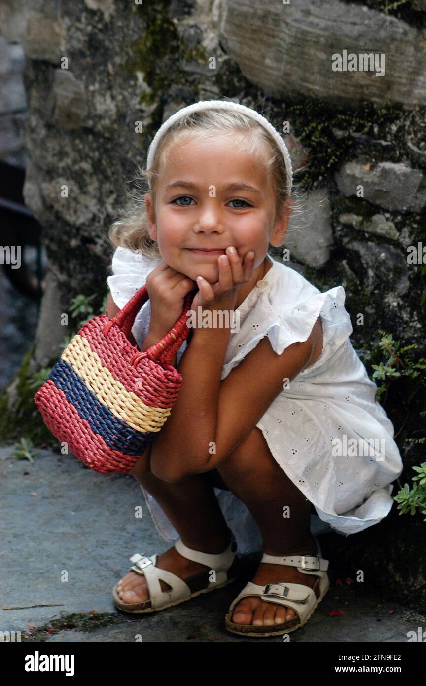 Little girl is posing, italian little girl Stock Photo - Alamy
