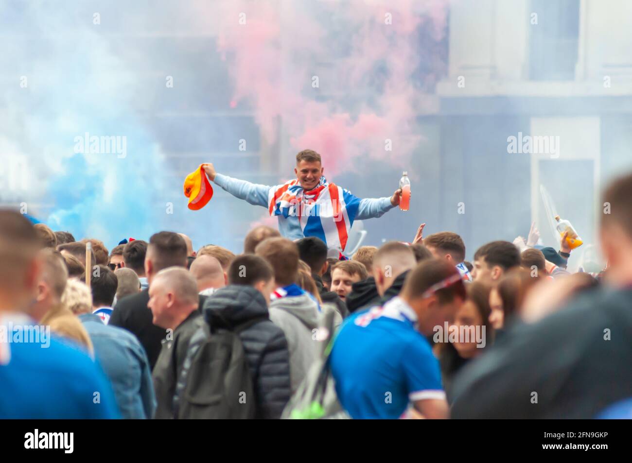 Glasgow, Scotland, UK. 15th May, 2021. Rangers fans celebrate winning ...