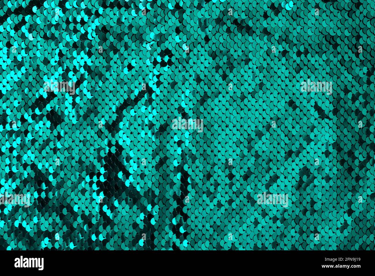 Abstract sequins green glitter wave background texture Stock Photo - Alamy