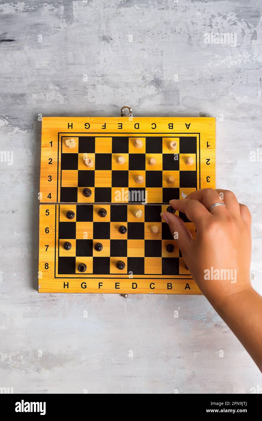Hand holding chess piece hi-res stock photography and images - Alamy