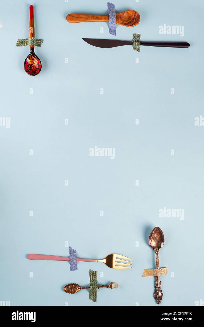 Different types of cutlery with a fork, knife, spoon and Chinese ...