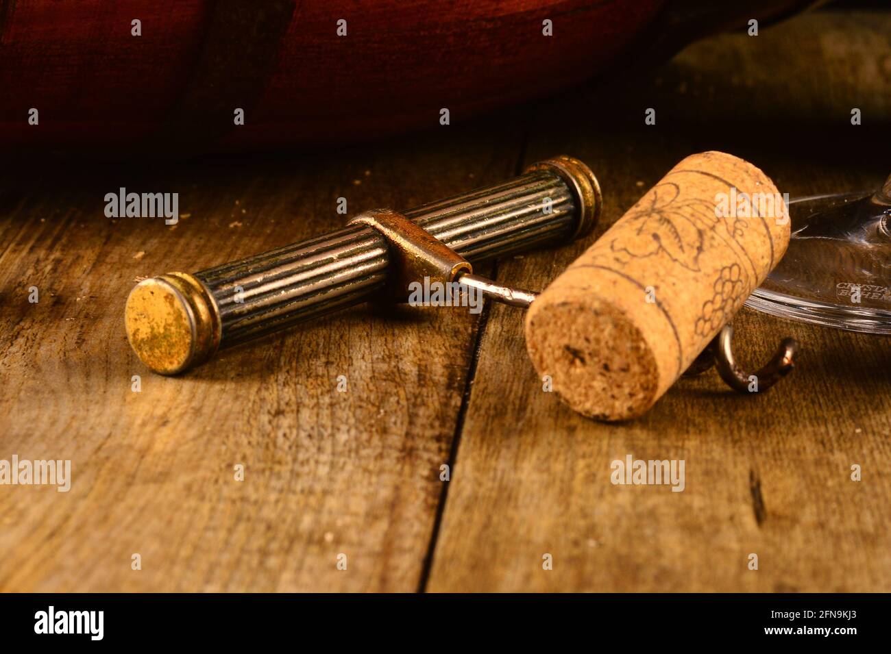 Bottle opener and cork Stock Photo - Alamy