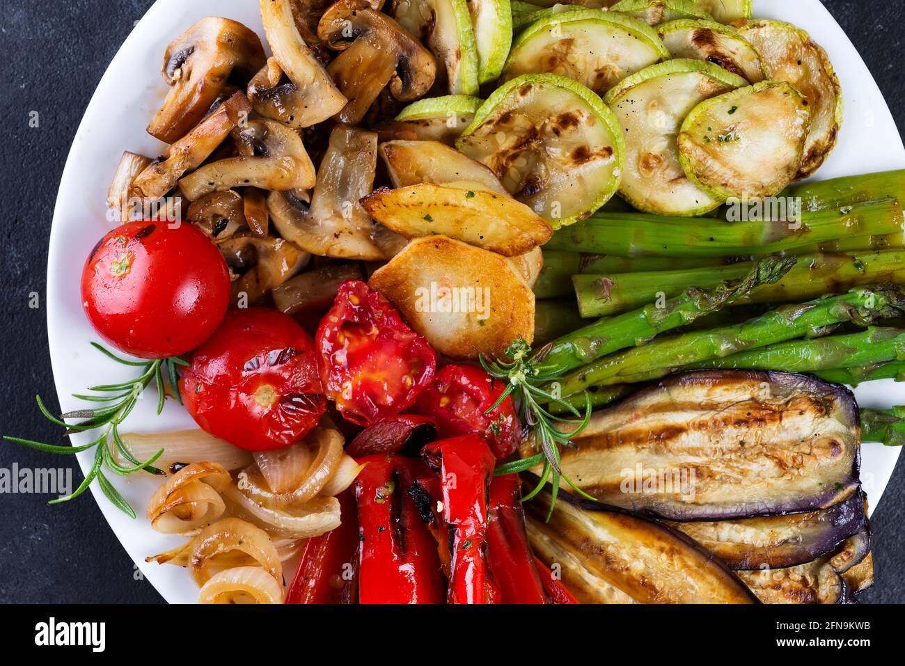 Grilled vegetables on a plate close up, flat lay Stock Photo - Alamy