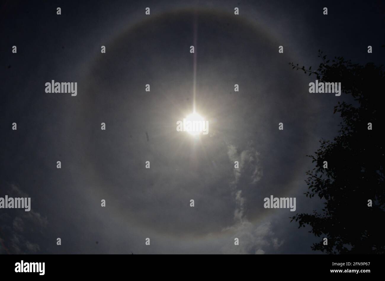 The halo phenomenon is seen around the sun in Srinagar. Sun halos are ...