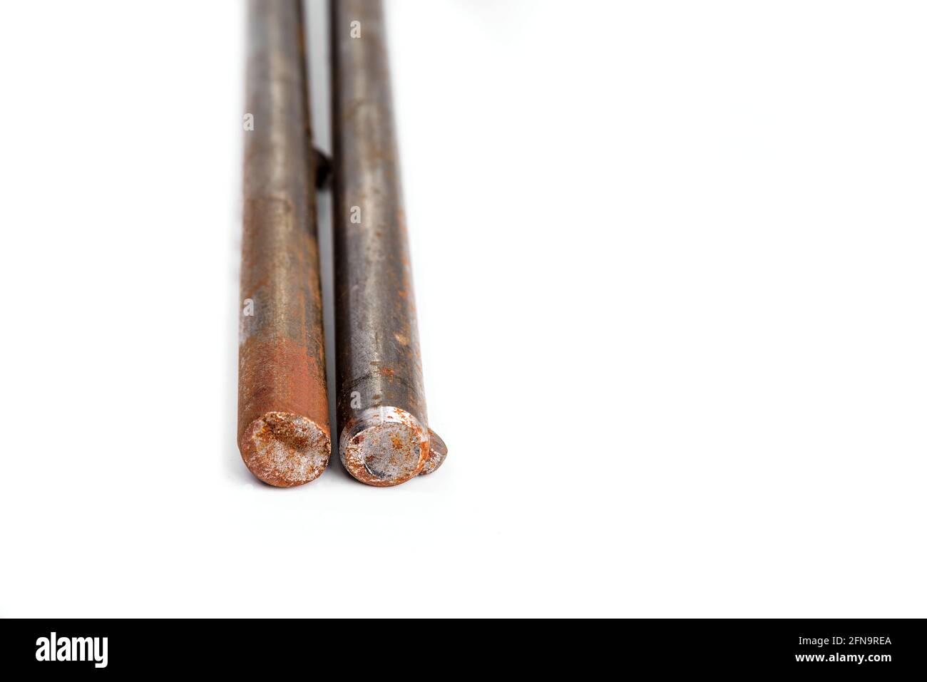 Smooth full metal rod on a white background Stock Photo - Alamy