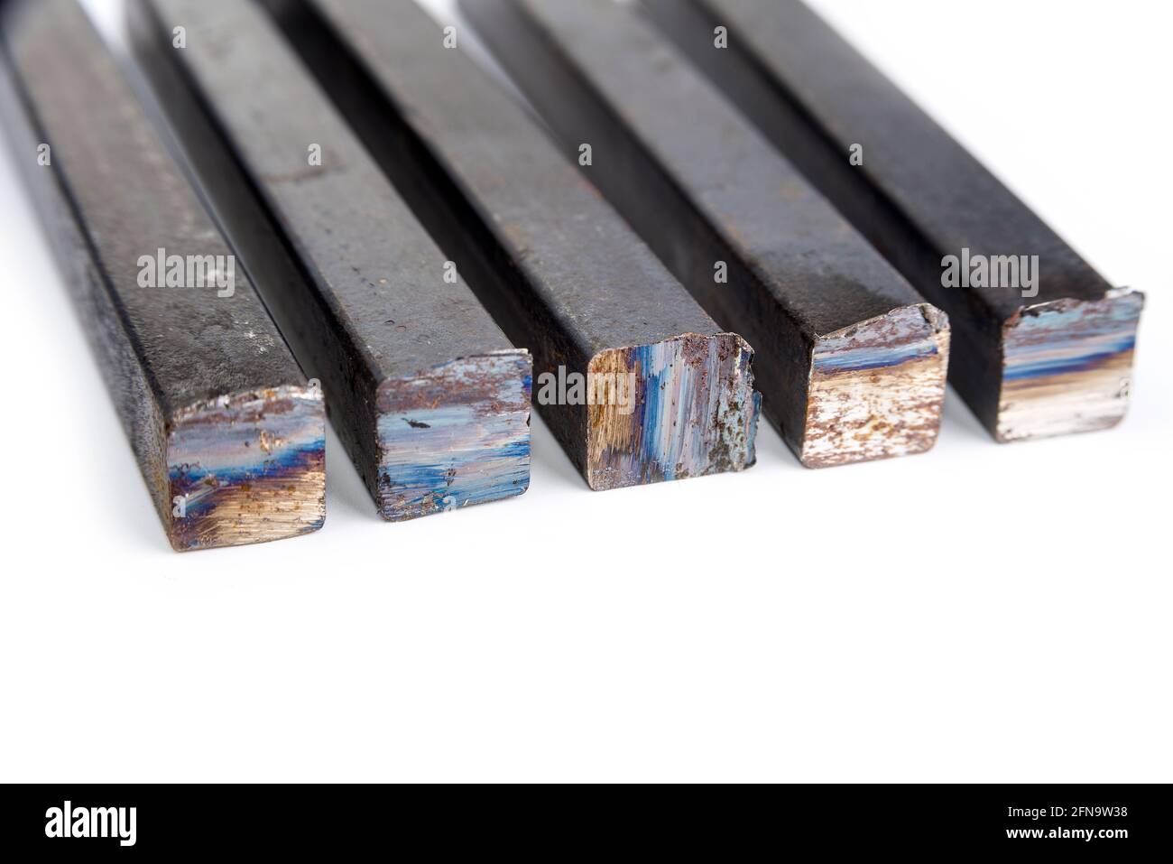 Square iron rod on a white background Stock Photo - Alamy