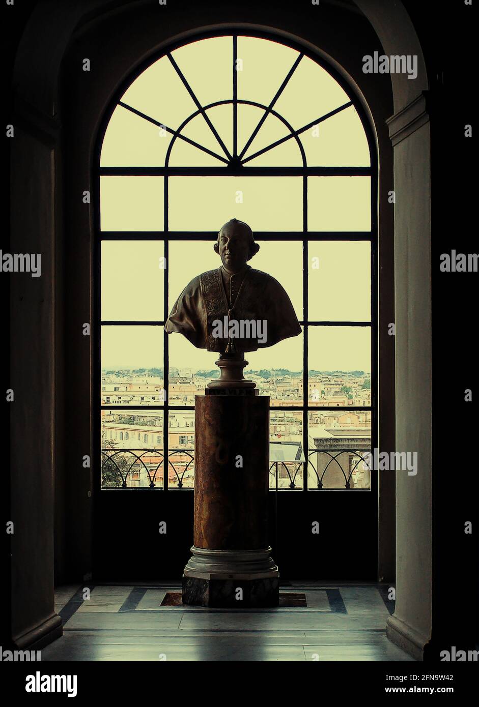 Sculpture by a window in a palace Stock Photo - Alamy