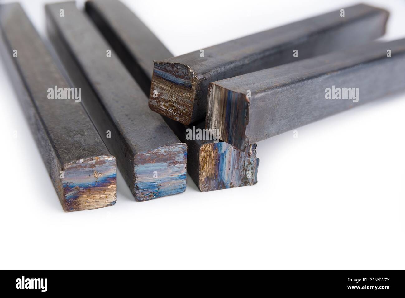 Square iron rod on a white background Stock Photo - Alamy
