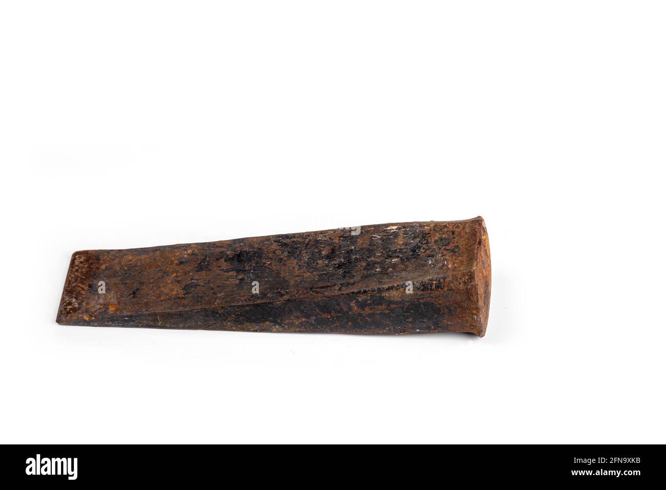 Wedge for splitting the wood on a white background Stock Photo - Alamy