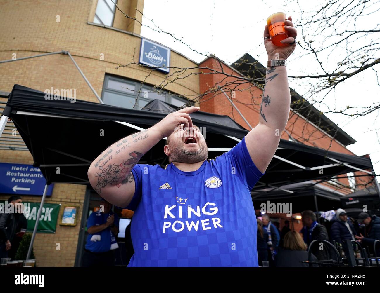 Leicester City fans celebrate victory outside the King Power Stadium ...