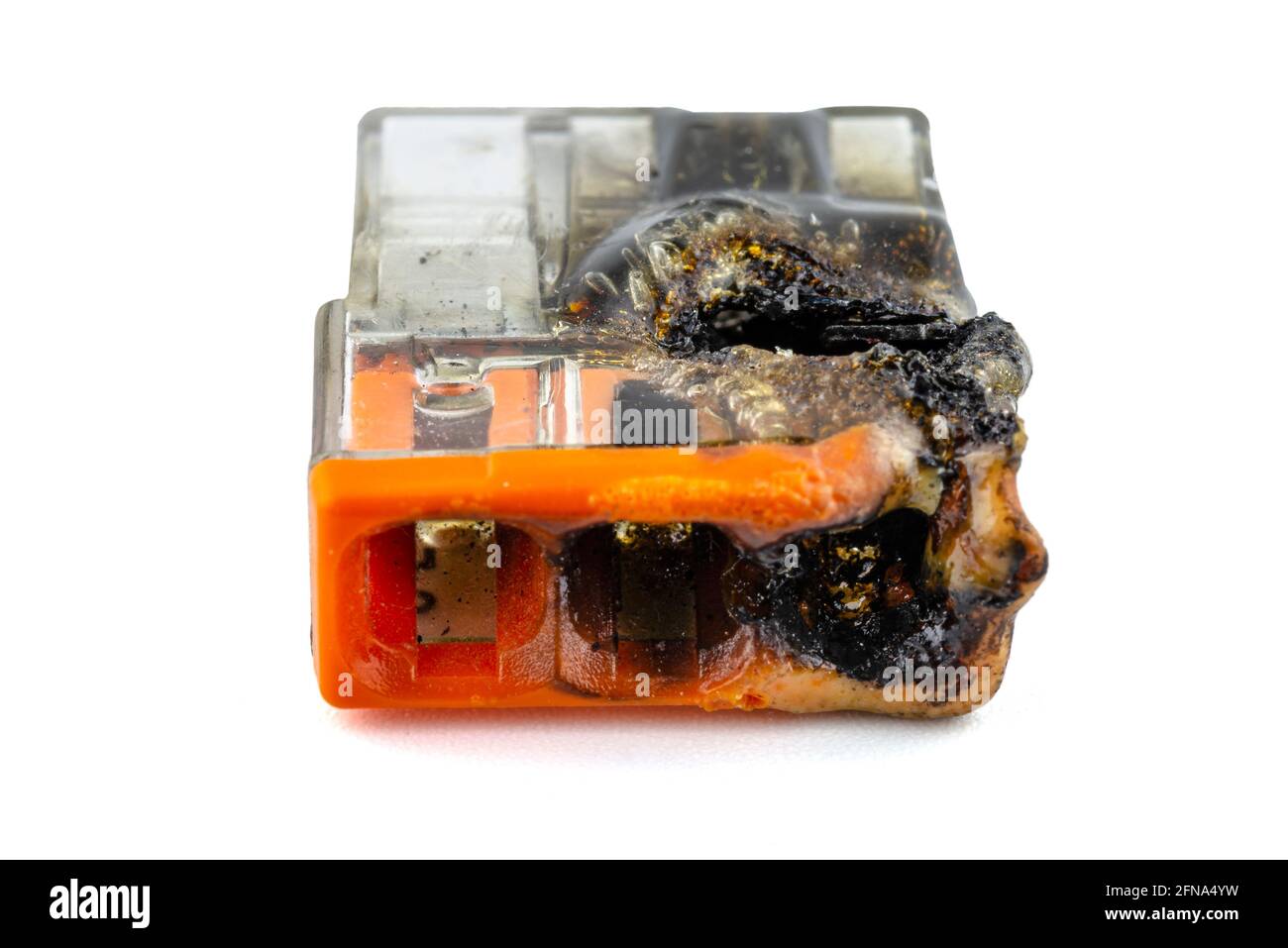 Burnt quick coupler for electric cables with three inputs, isolated on ...