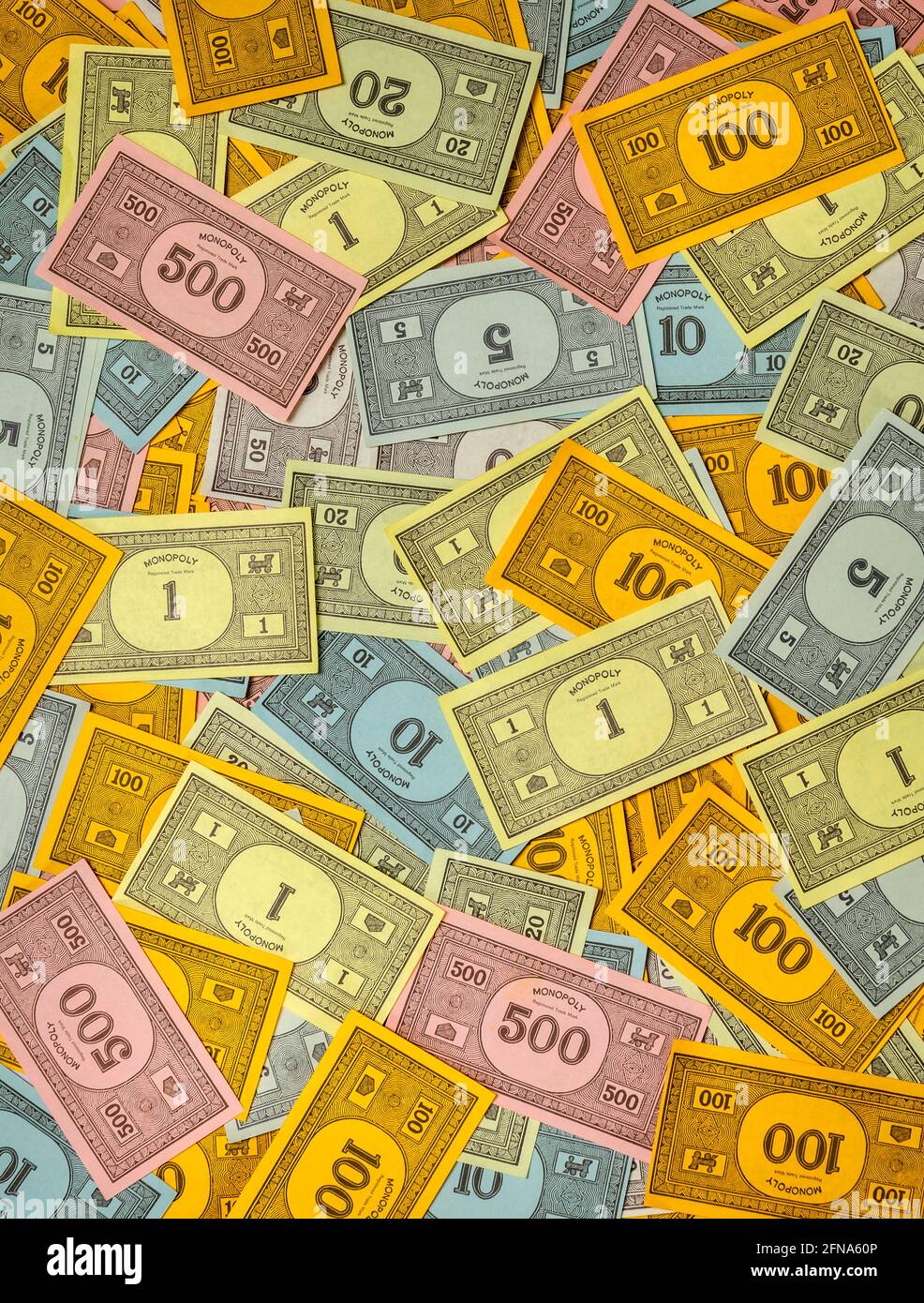 Portrait view of Monopoly Money in a pile Stock Photo - Alamy
