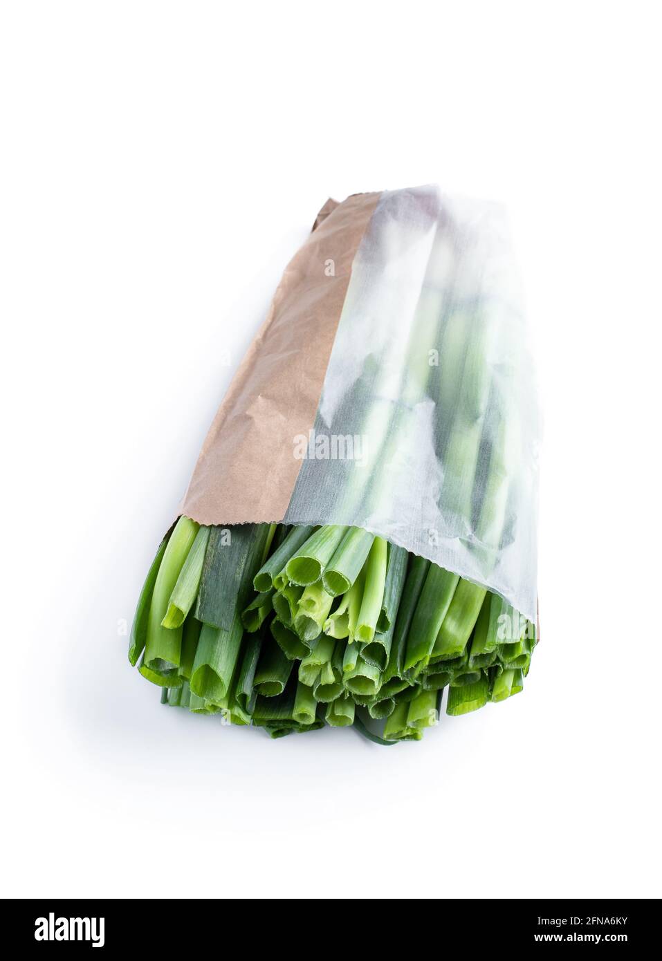 Bunch of spring onion in a paper bag isolated on white Stock Photo - Alamy
