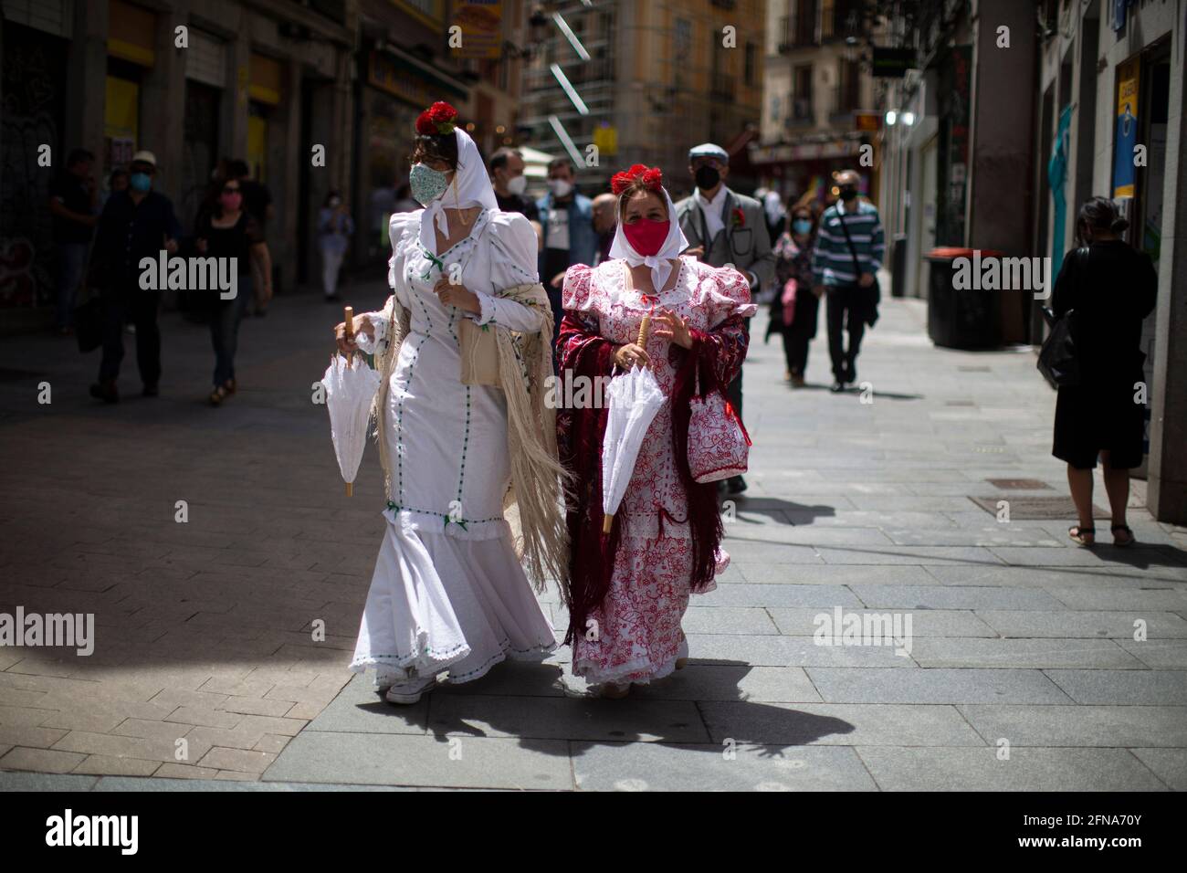 Madrid, Spain. 15th May, 2021. Two women dressed in traditional ...