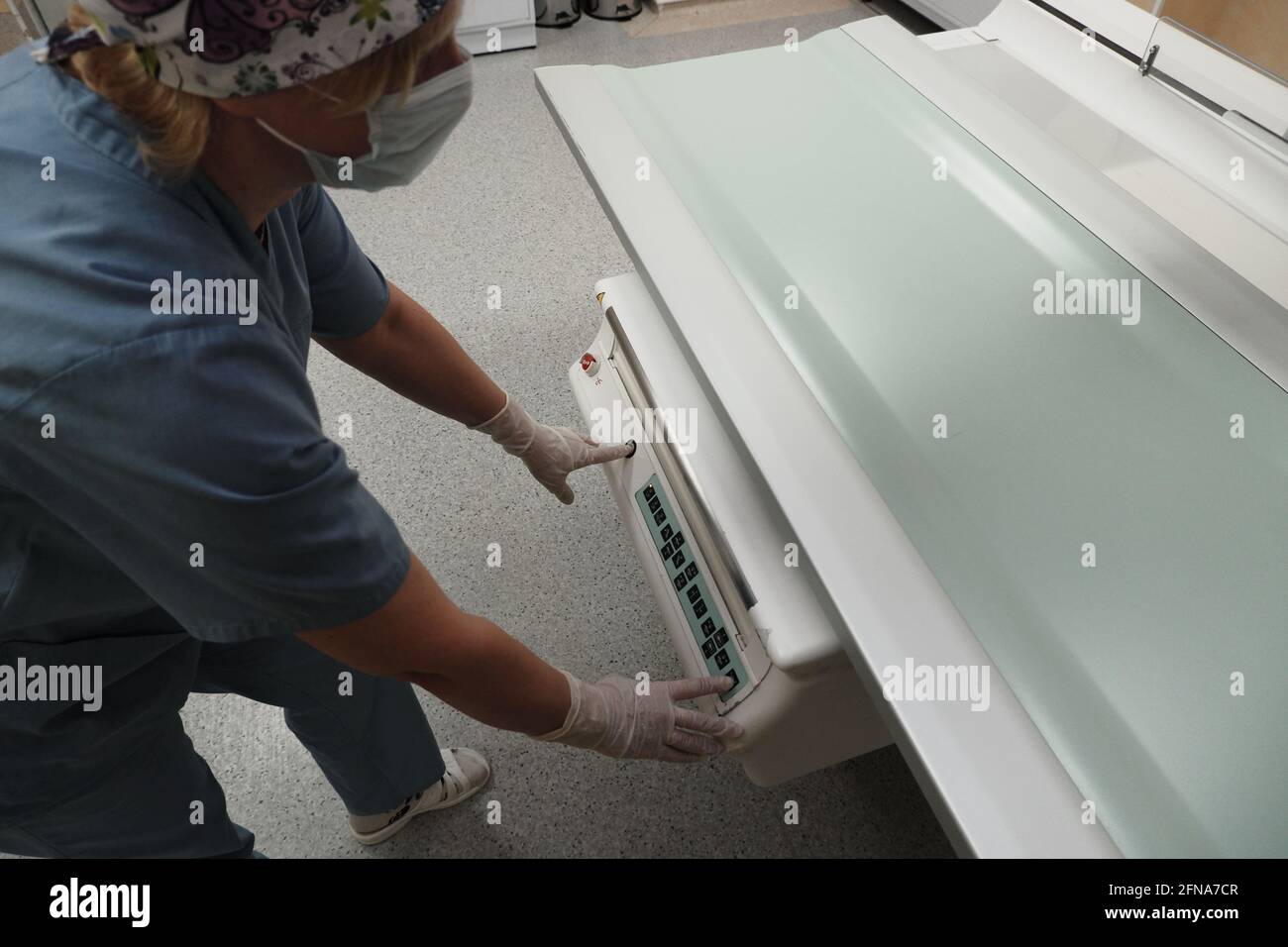 The work of a radiologist in the X-ray room for diagnostics Stock Photo ...