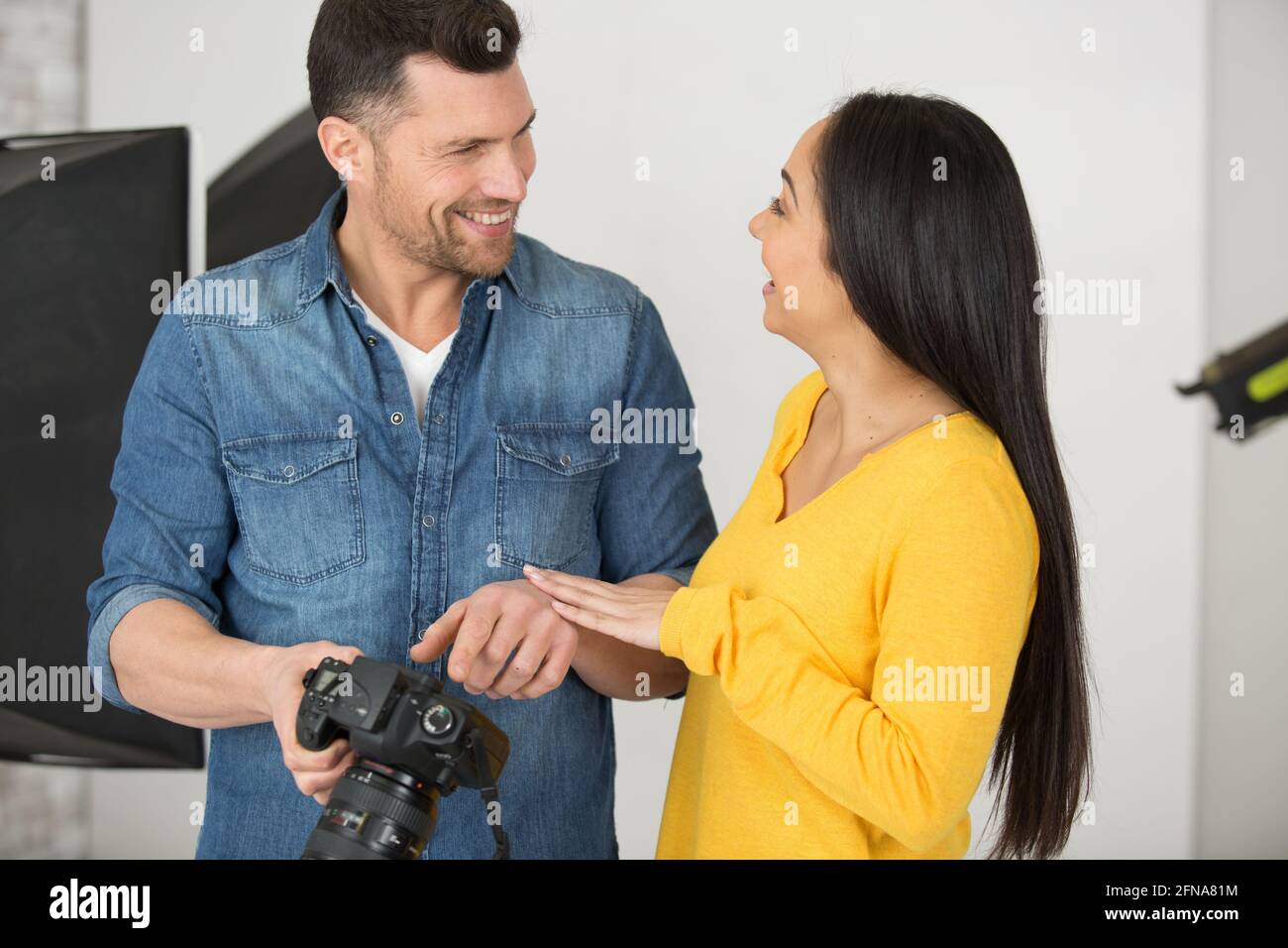 photographer and model talking about session Stock Photo - Alamy