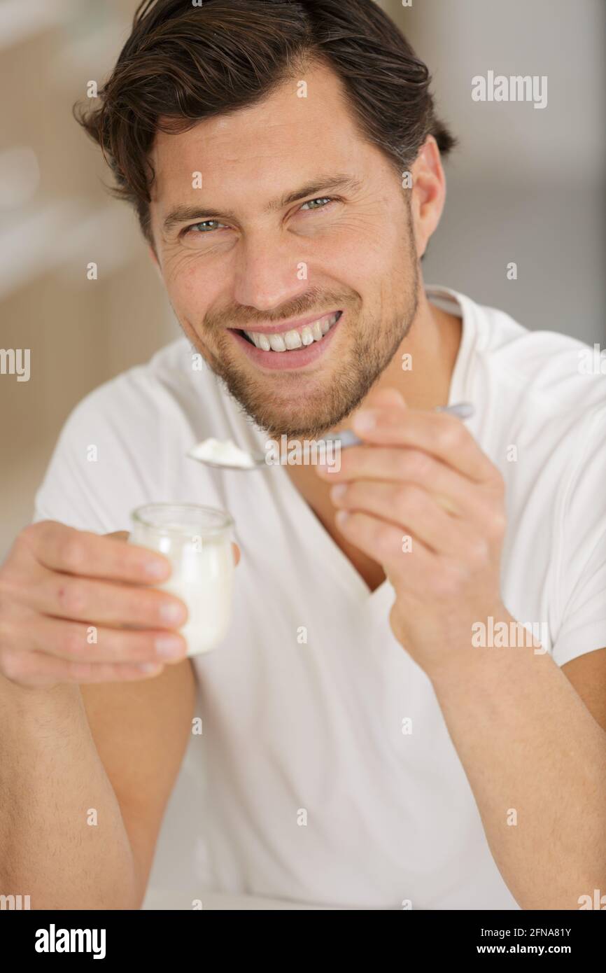 Man holding a spoon hi-res stock photography and images - Alamy