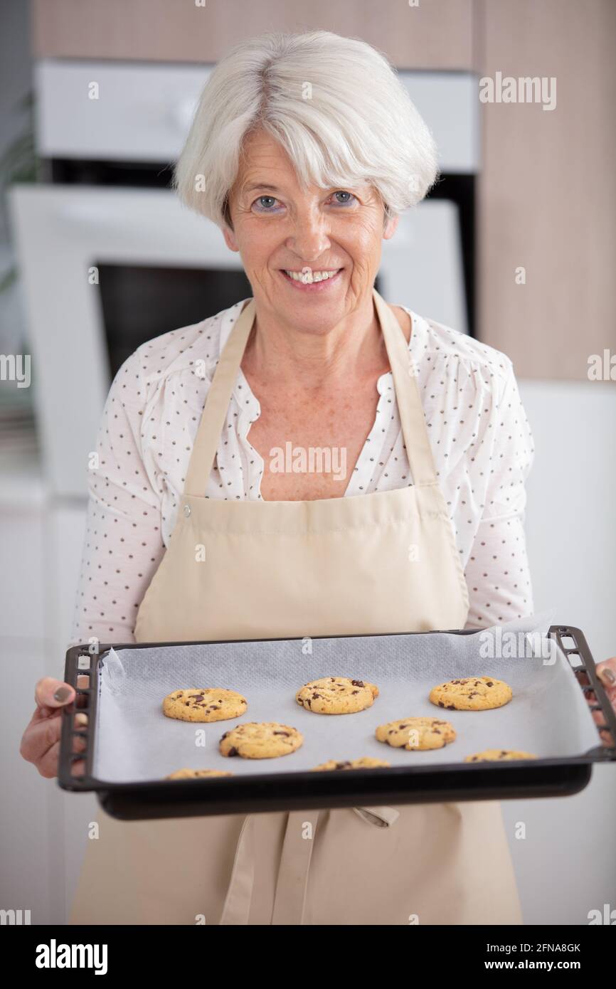 Grandma holding tray hi-res stock photography and images - Alamy