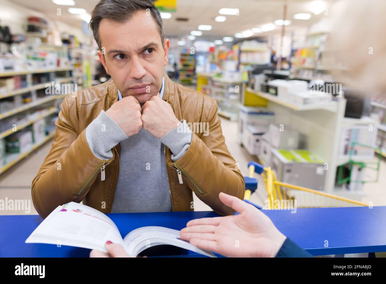 Hardware store assistant hi-res stock photography and images - Alamy