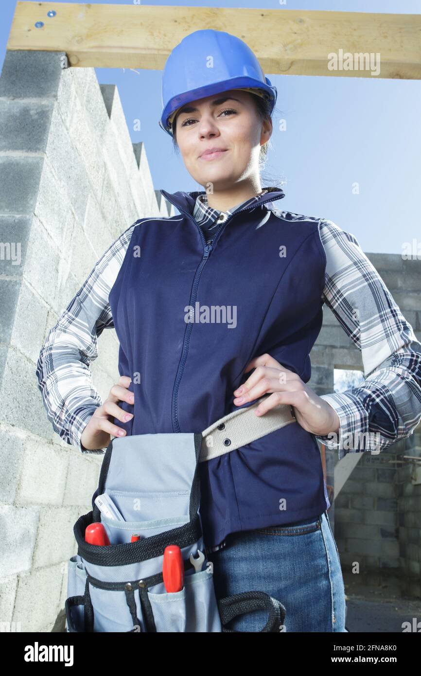 beautiful woman builder standing confidently Stock Photo - Alamy