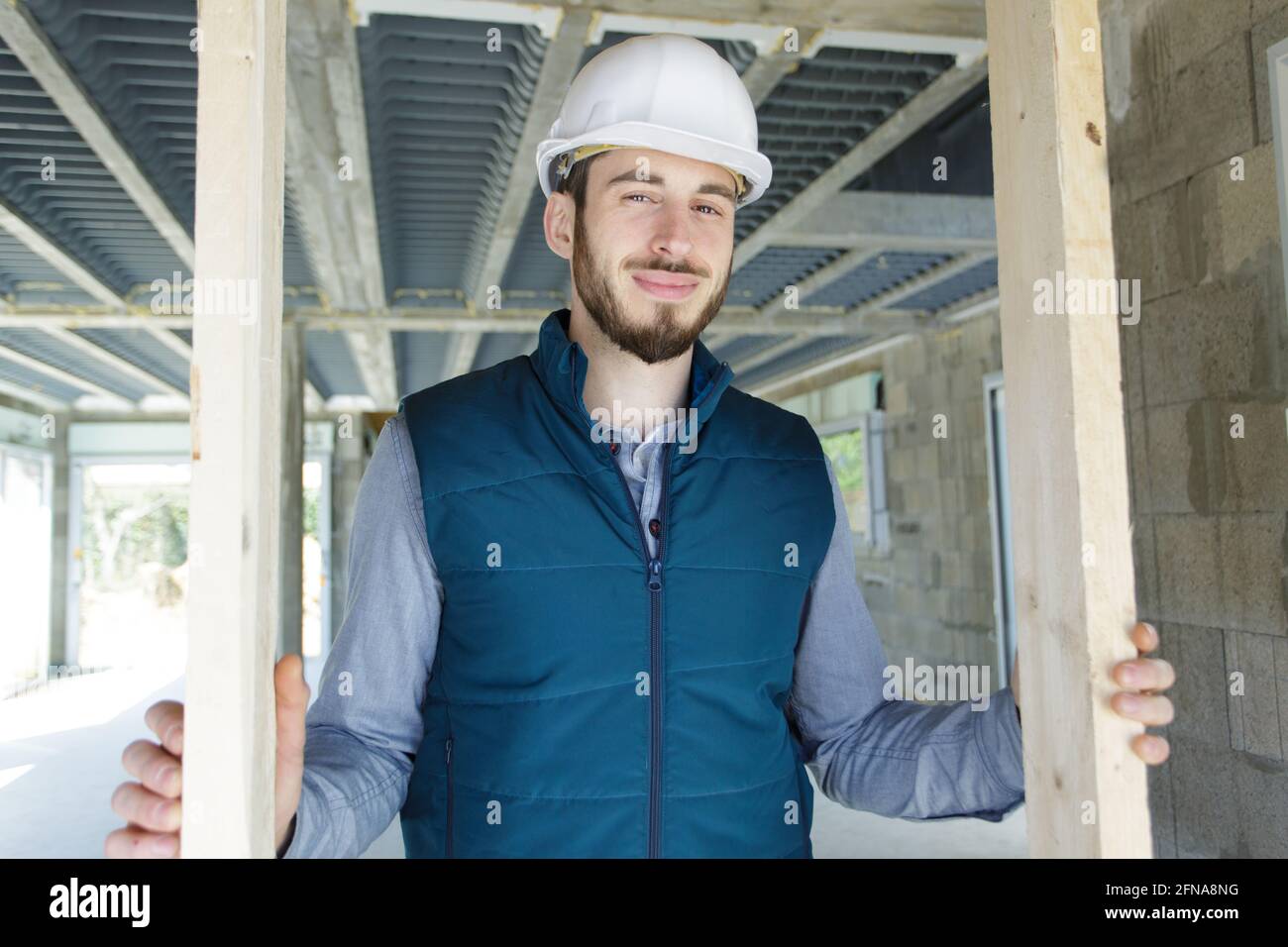 construction engineer looking at the camera Stock Photo - Alamy