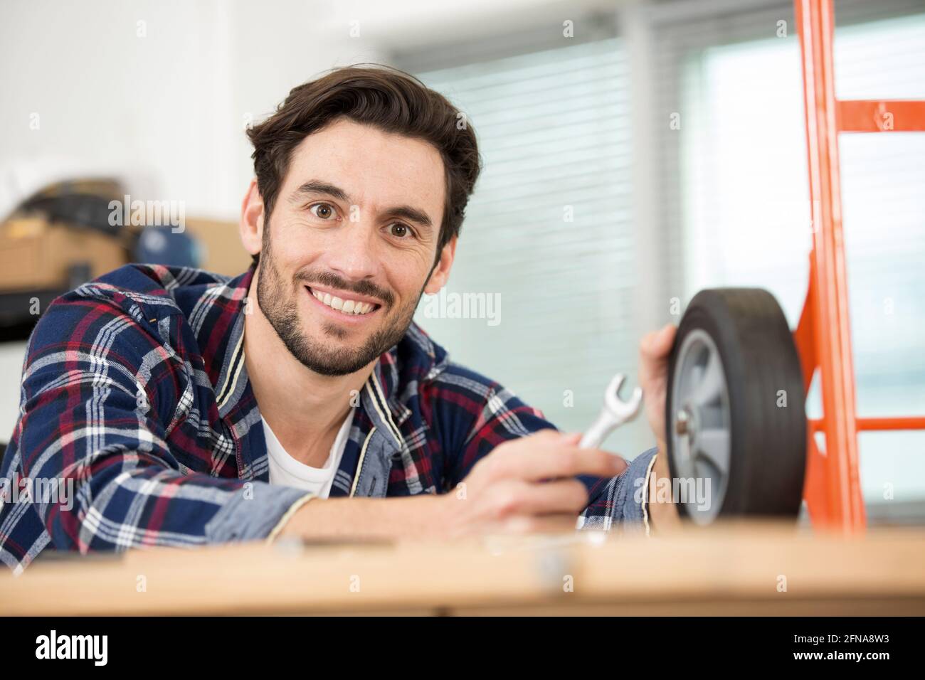 Delivery man setting truck hi-res stock photography and images - Alamy
