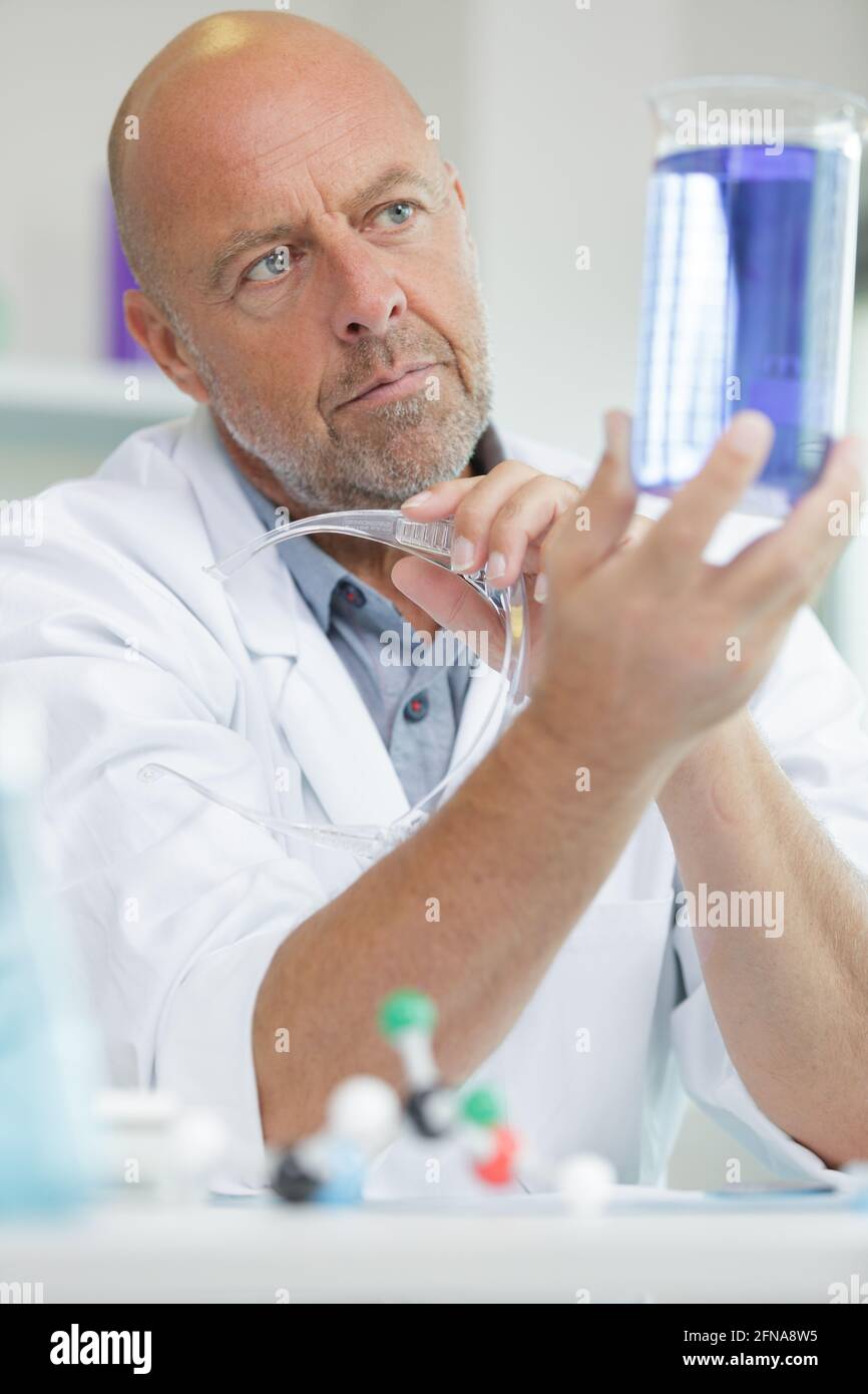 Serious scientists working in hi-res stock photography and images - Alamy
