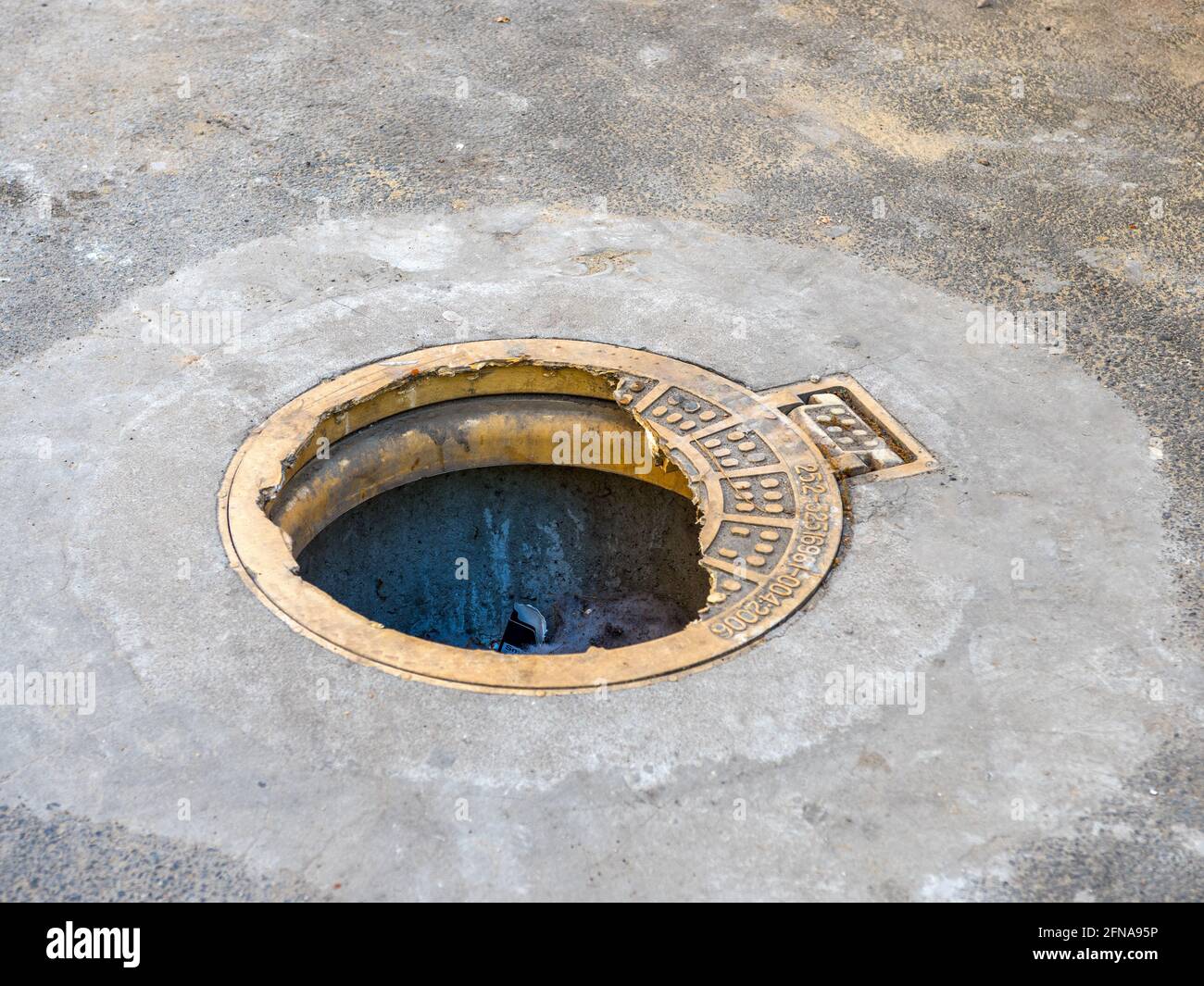 Broken manhole hi-res stock photography and images - Alamy