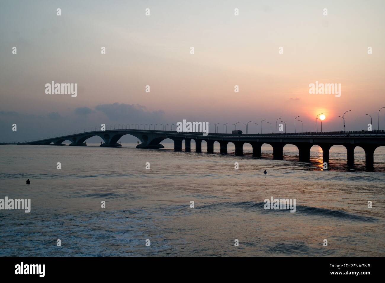 Sunrise over a Sinamale bridge in Male', Maldives Stock Photo - Alamy