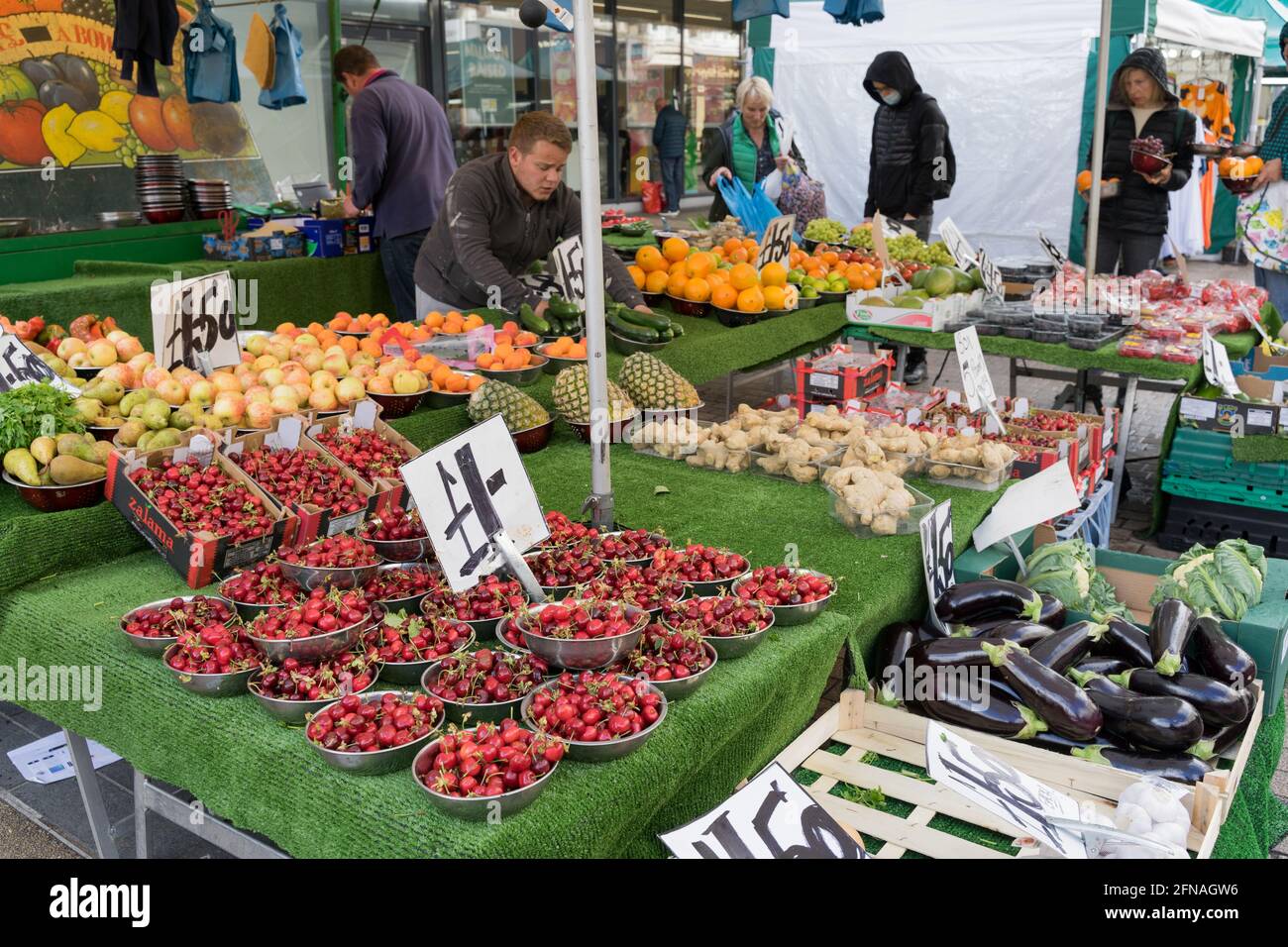 fresh cherries in bowls for sale in Market fruit stall in Bromley ...