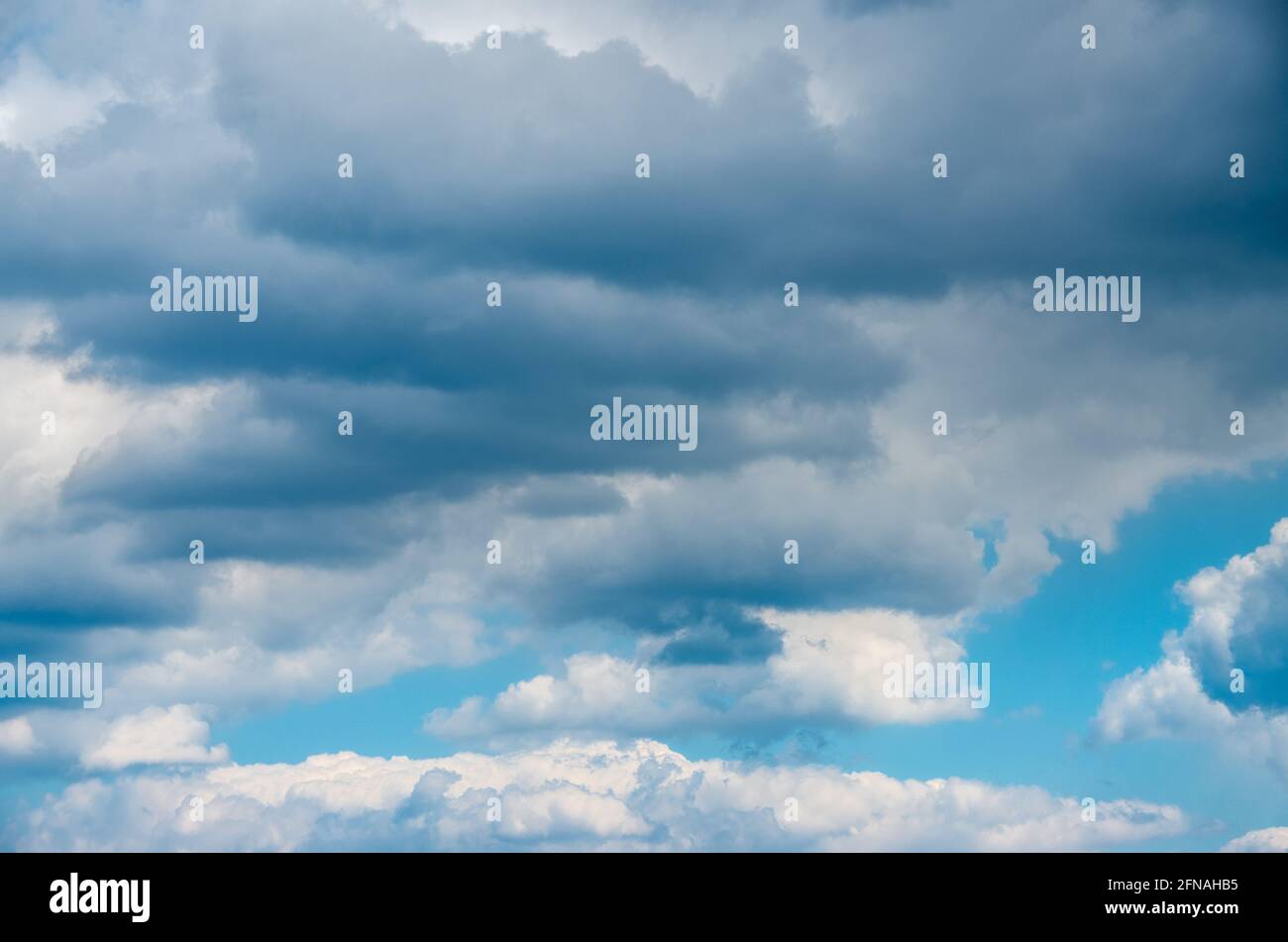 View into impressive spring sky with thick clouds as a texture or ...