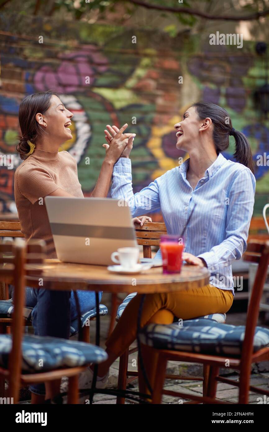 Beautiful girls sitting bar in hi-res stock photography and images - Alamy