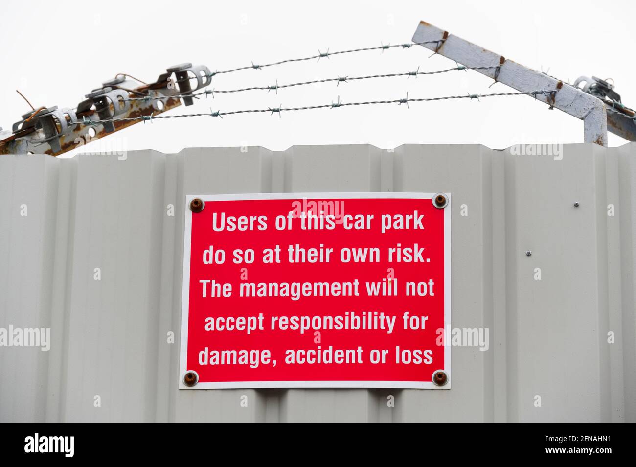 Car park users do so at own risk sign Stock Photo - Alamy Car park users do so at own risk sign Stock Photo - Alamy