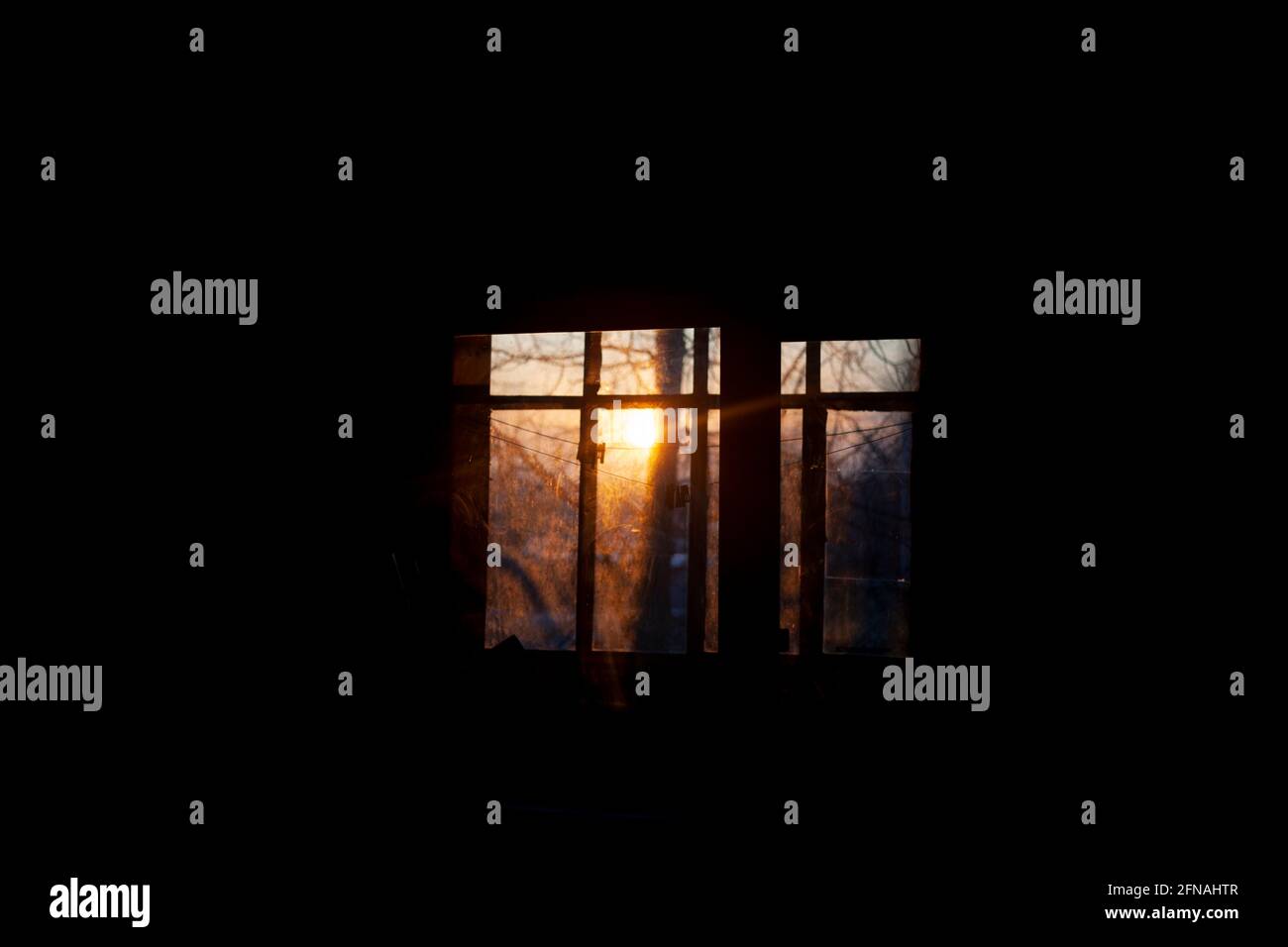 Light in the window in the morning. Background awakening at dawn ...