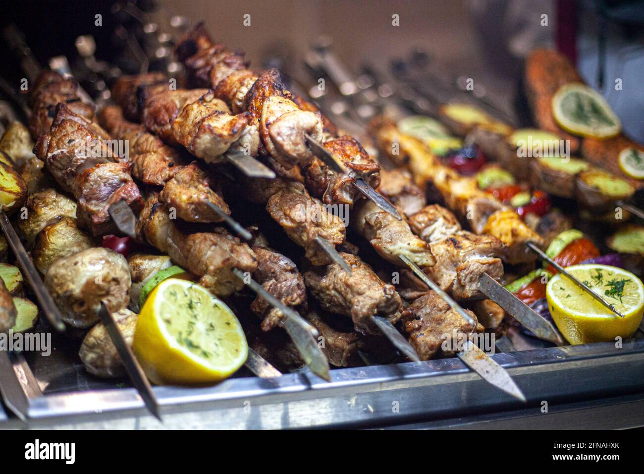 Georgian kebab. Tasty meat fried on skewers. A lot of meat cooked ...