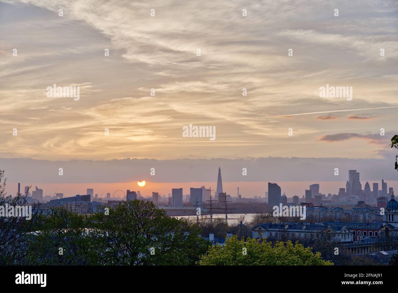 Spring sunset over London Skylines viewed from South of river Thames ...