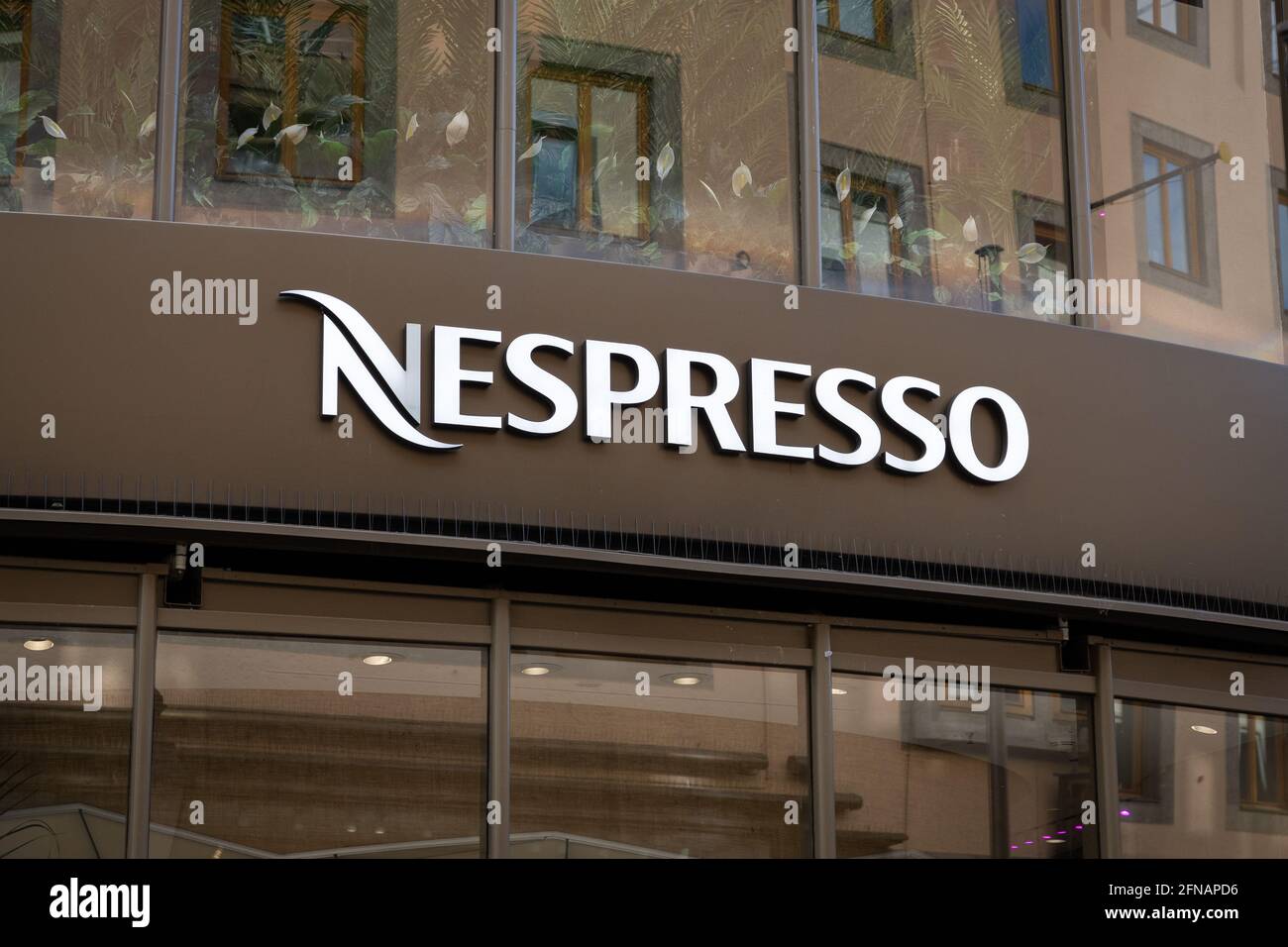 Nespresso store sign in Munich town center Stock Photo - Alamy