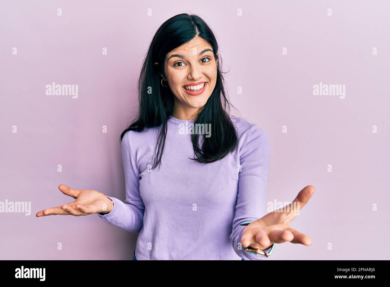 Young hispanic woman wearing casual clothes smiling cheerful with open ...