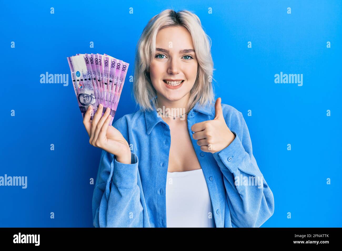 Philippine Peso Cash Sign High Resolution Stock Photography and Images ...