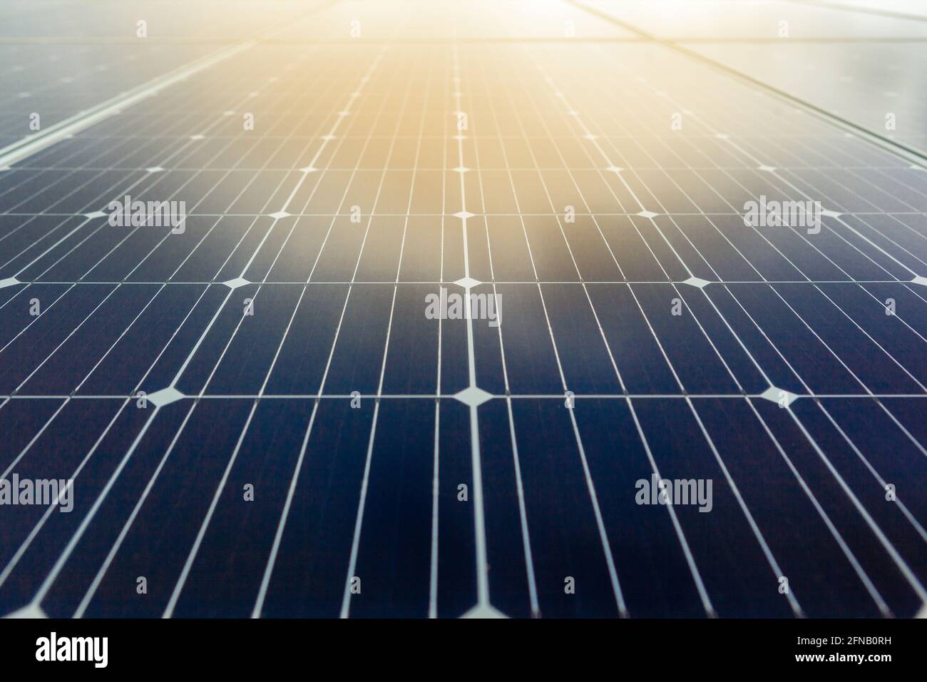 A low angle shot of modern solar panels under the sunlight ...
