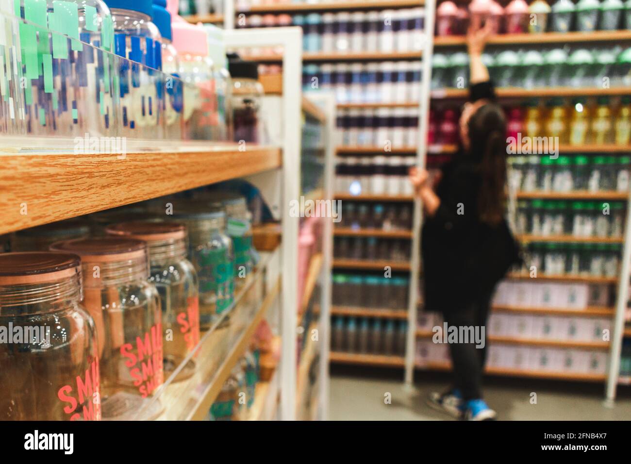 Alamy A woman shops for toys in a toy store Stock Photo - Alamy