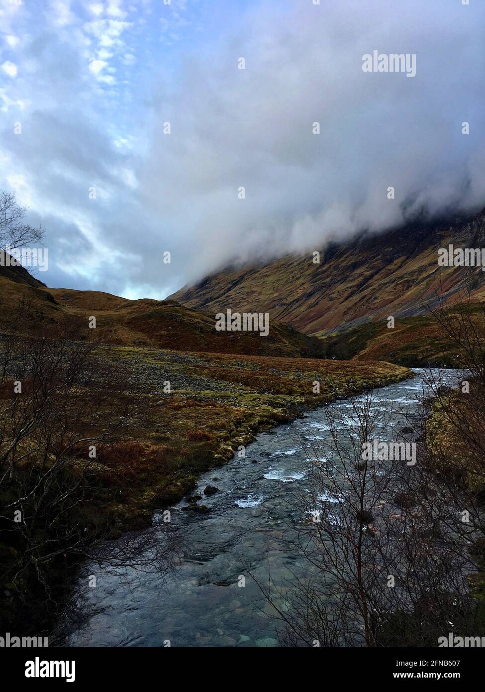 Crystal Clear River Flowing Through A Glen In The Scottish Highlands ...