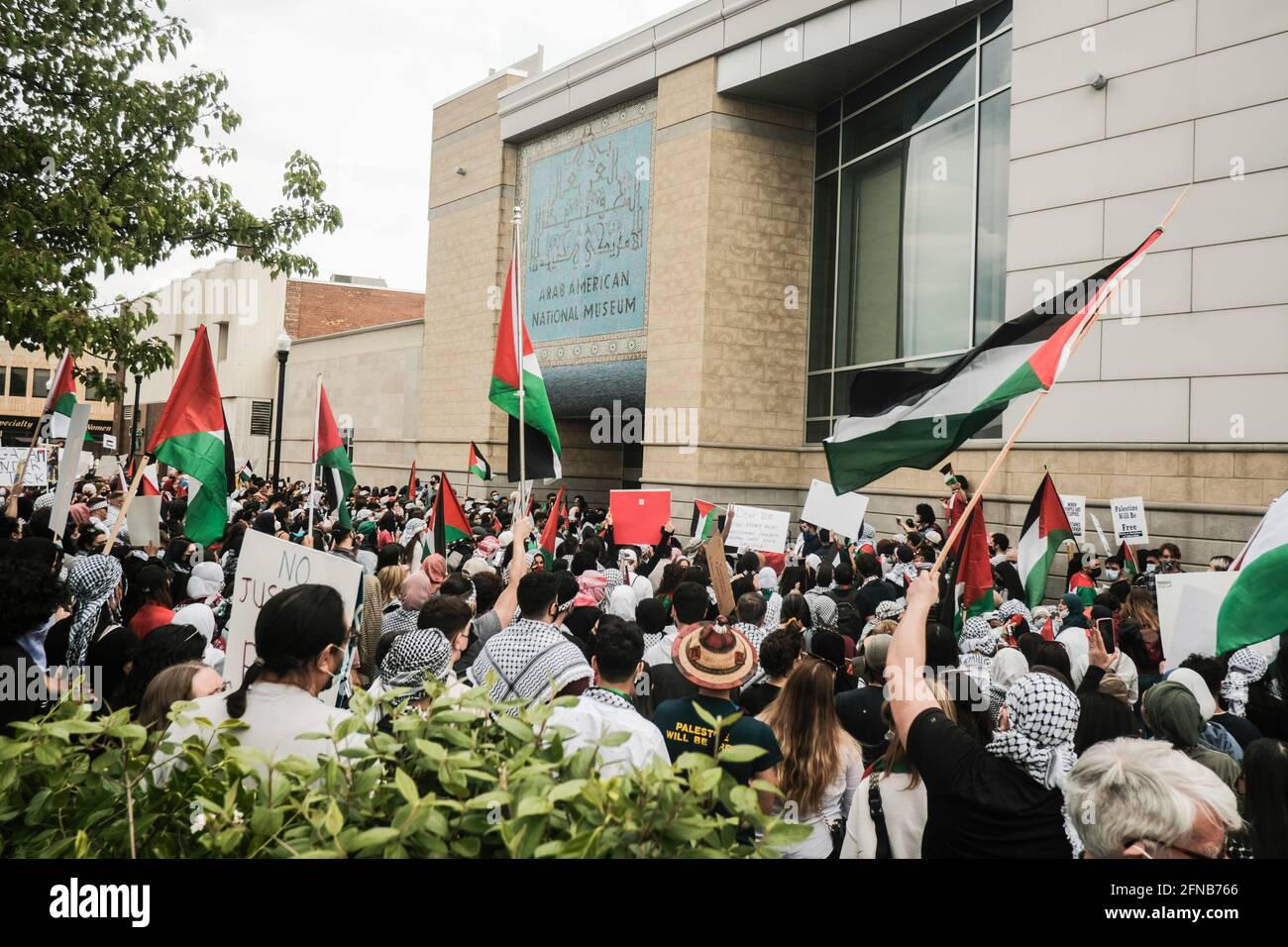Detroit, USA. May 15 2021: Protesters waving Palestinian flags during a ...