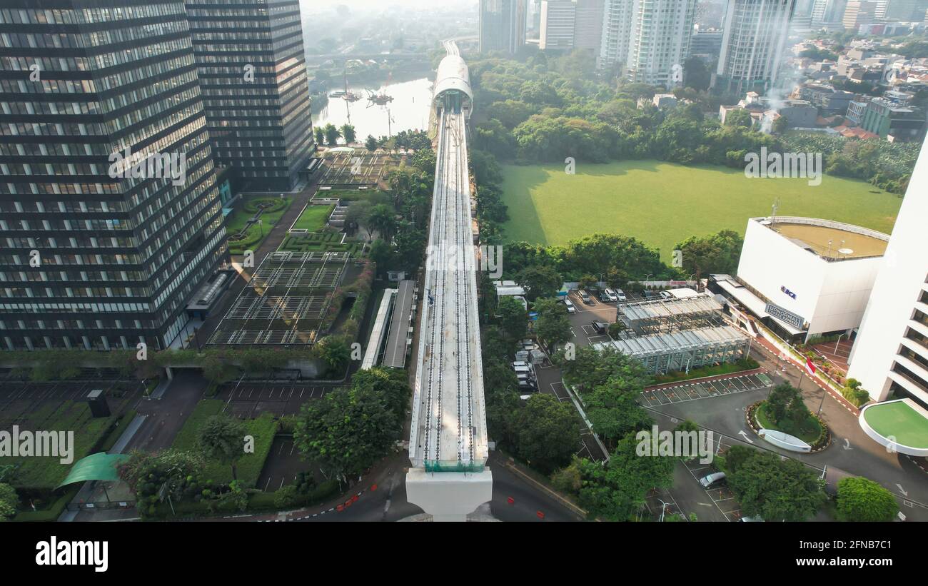 LRT , Monorail movement on track moving fast taken at station Sudirman ...