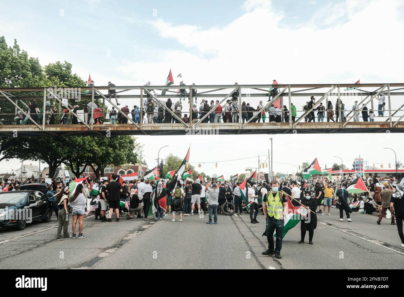 Protesters pause marching for speeches, during a large free Palestine ...