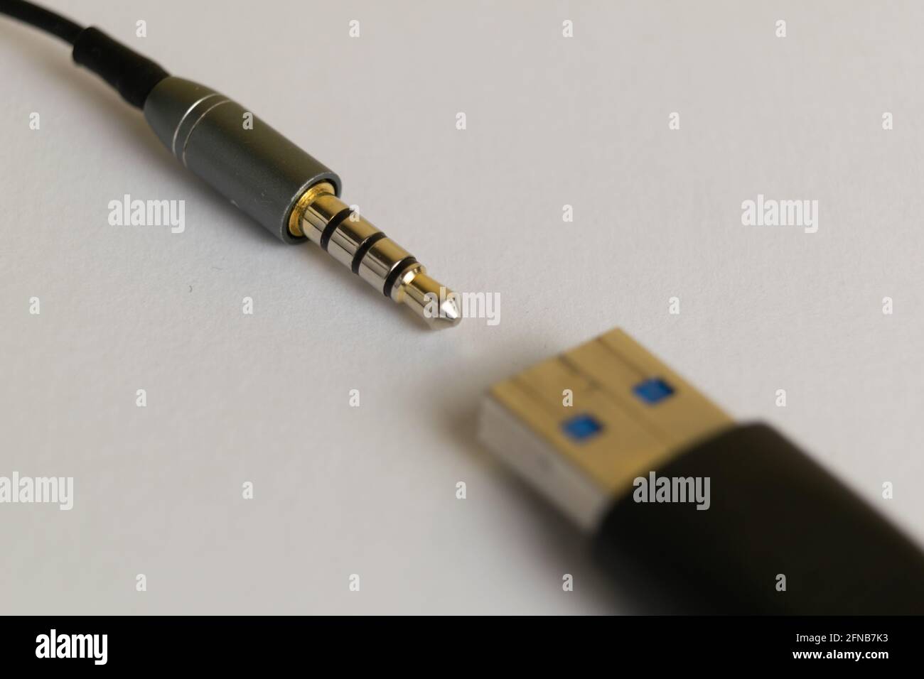 Audio plug from headphone or music device with USB connector Stock ...