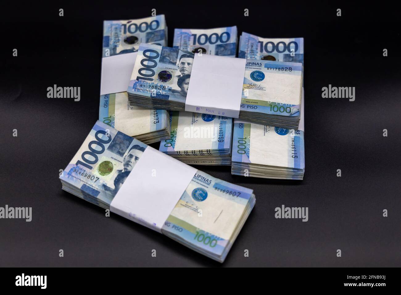 A pile of one thousand Philippines banknotes. Cash of Thousand dollar ...