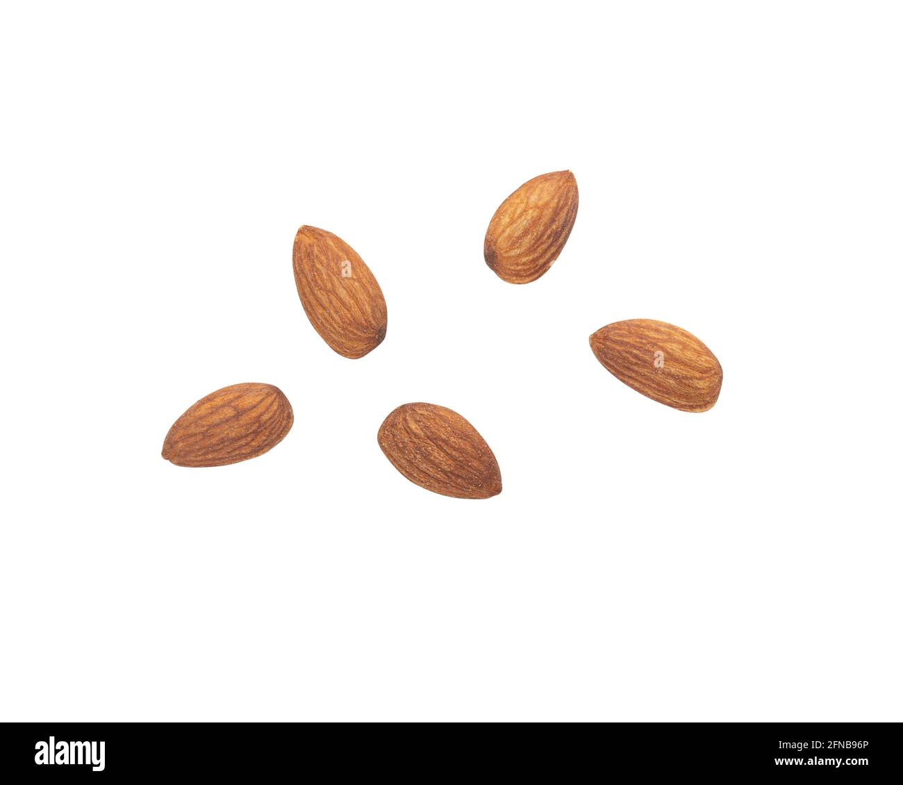 Almonds falling isolated on white background with clipping path Stock ...